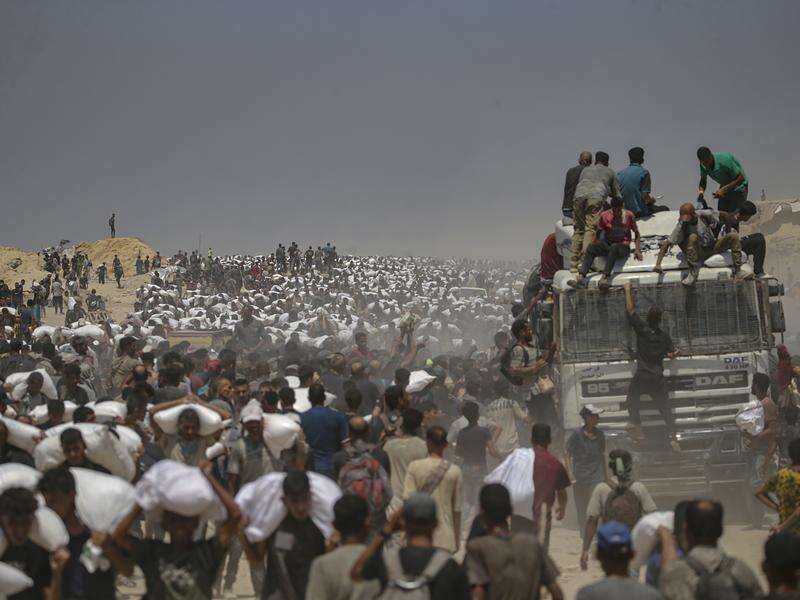 Aid lorries enter Gaza as Israel takes 'tactical pause' | Cobram Courier