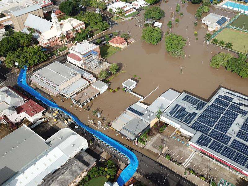 Floods surge through drains in Qld city | Kyabram Free Press