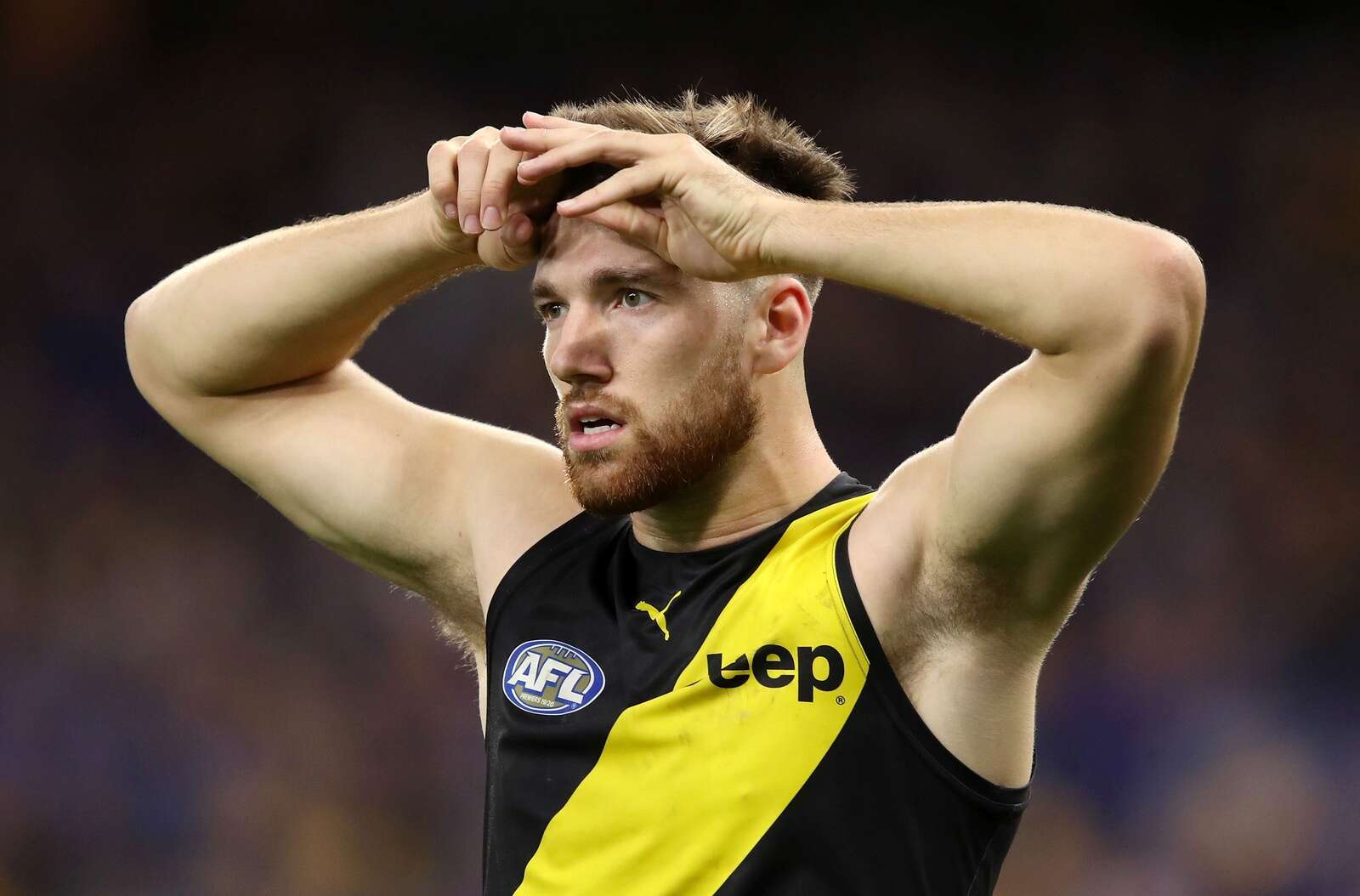 AFL to investigate after Richmond star charged from a local club ...