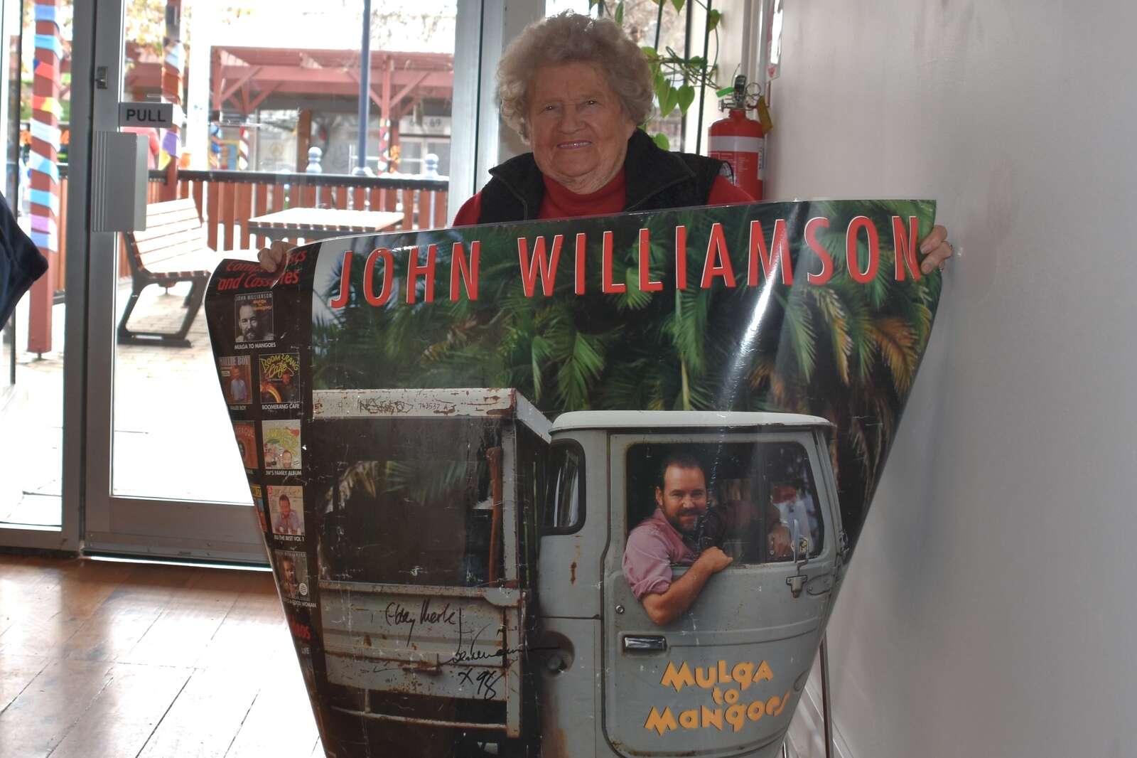 Merle uncovers long-lost signed John Williamson poster | Riverine Herald