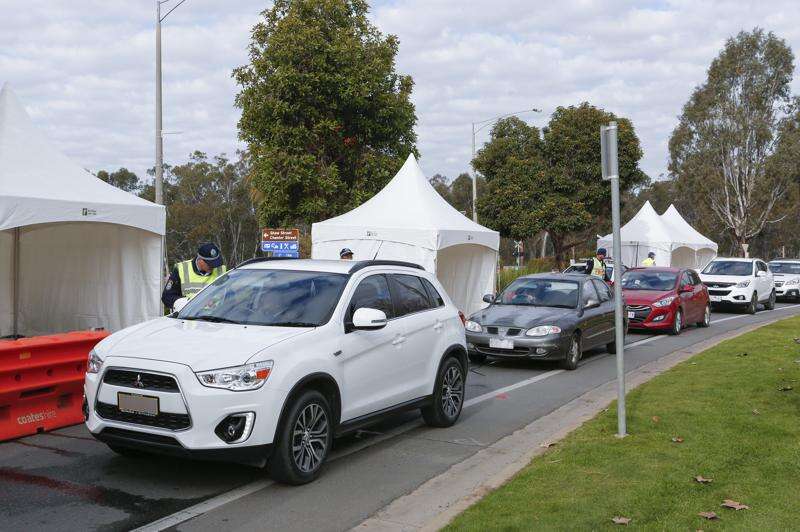 Couple charged after allegedly hiding in ute at Echuca Moama border ...