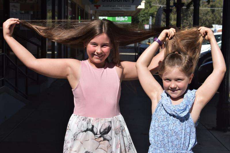 Benalla sisters donate hair to charity | Shepparton News